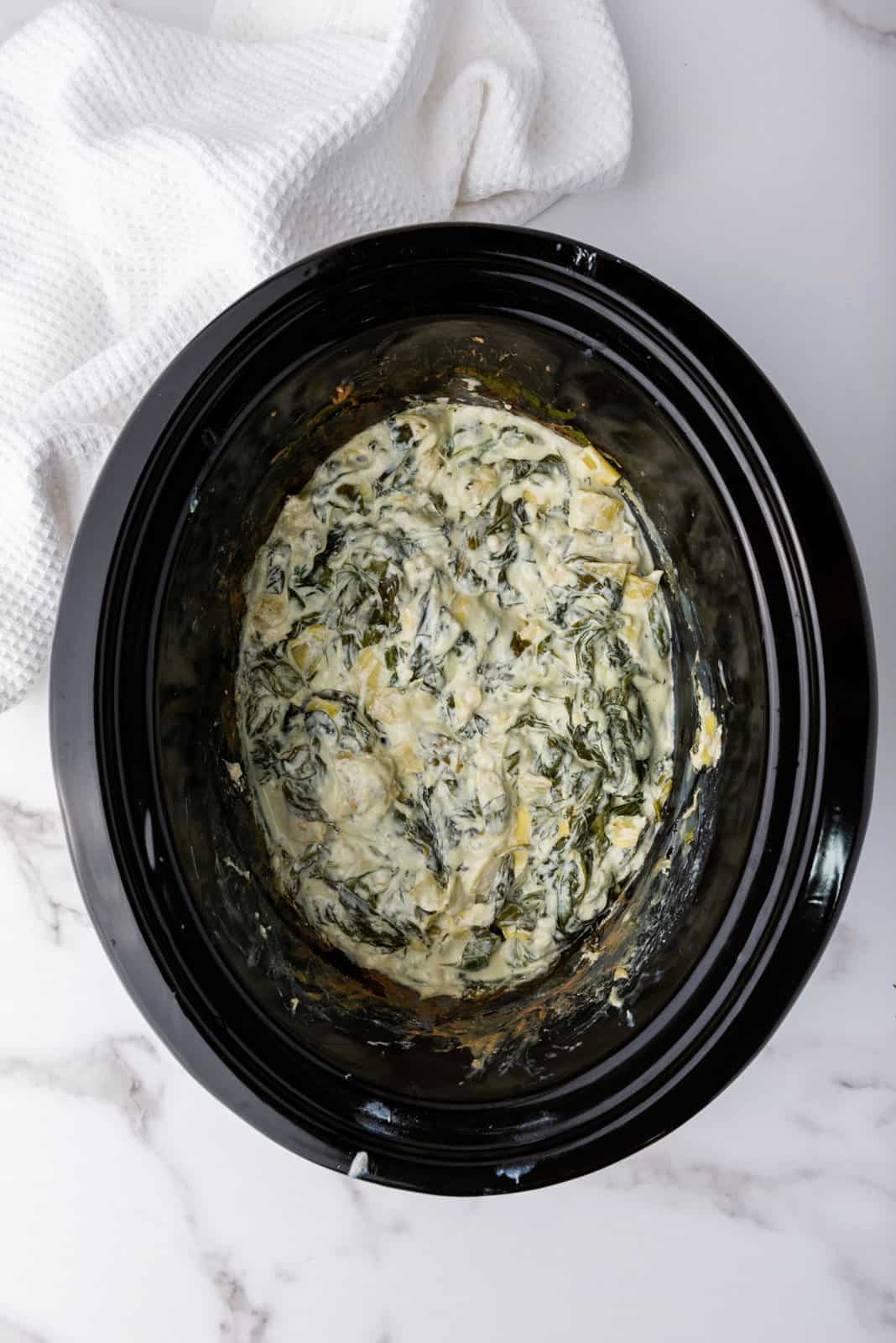 Slow Cooker Spinach Artichoke Dip Shaken Together
